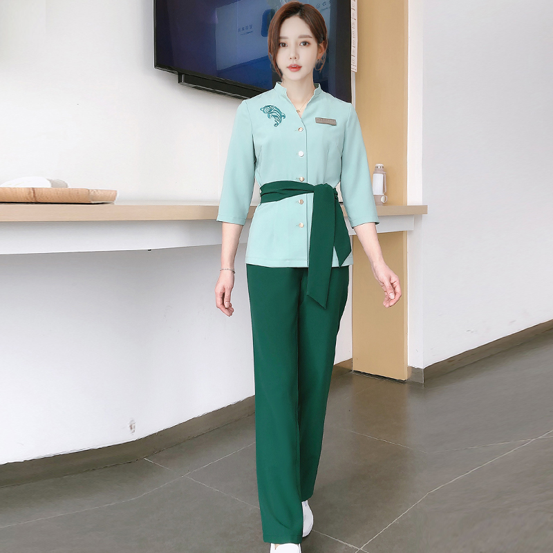 Lobby receptionist customizes hotel uniforms