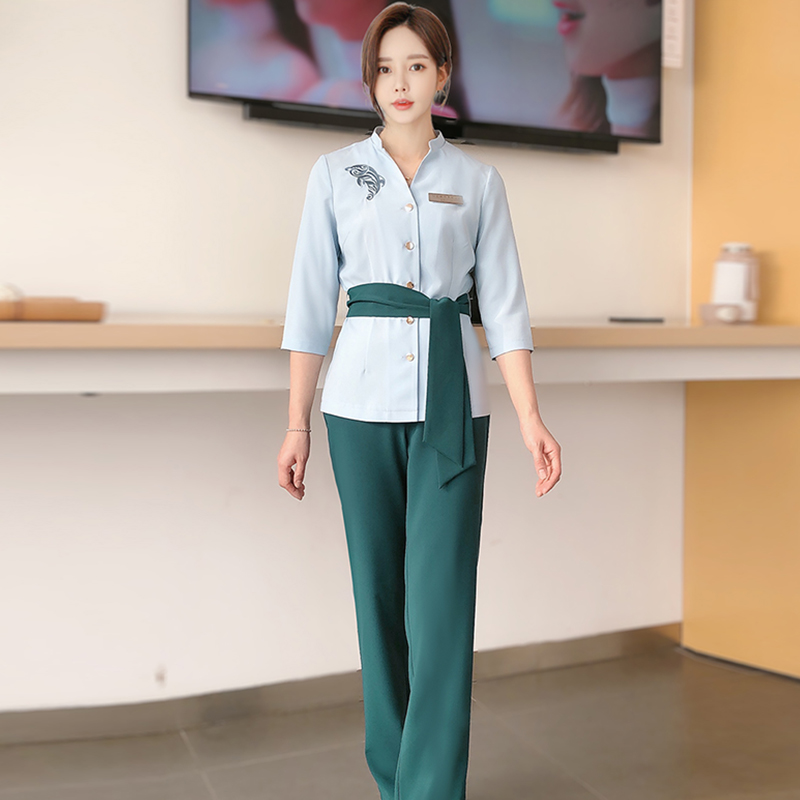 Lobby receptionist customizes hotel uniforms
